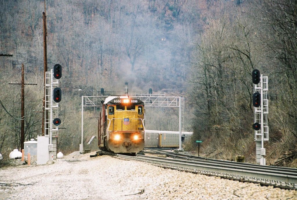 UP 9350 leads a single unit rack train Eastbound